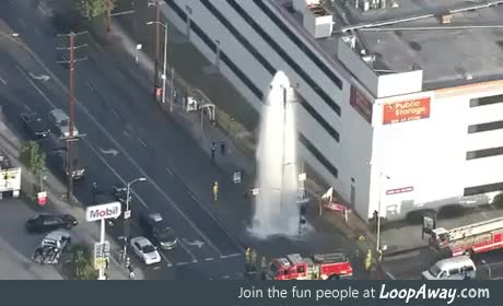 Ruptured fire hydrant combined with high voltage power lines - LoopAway.com