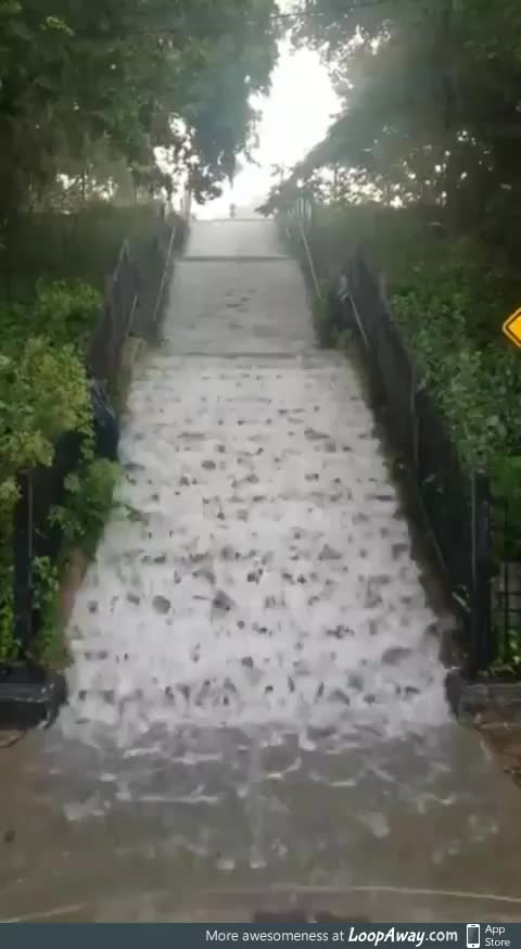 Flash flood turns brooklyn staircase into epic urban waterfall ...